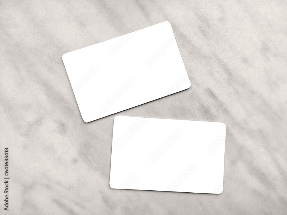 Double-sided business card template with rounded edges on a gray marble ...