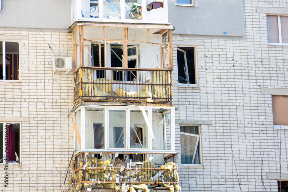 Destroyed apartments in the house after being hit by a downed rocket ...