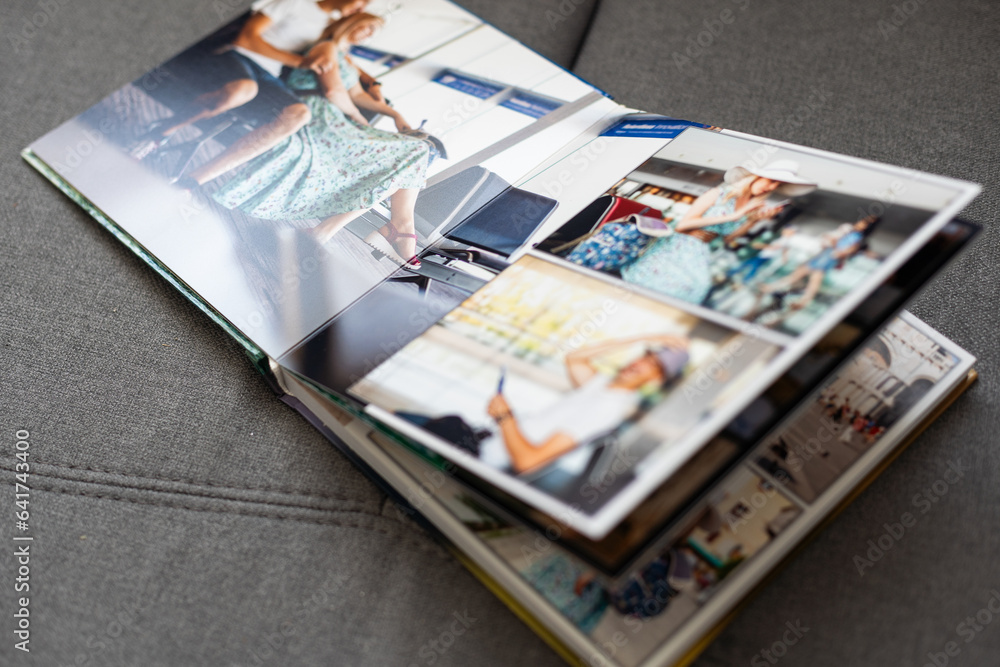 close up. photo book binding. storing photos from a photo session in a ...