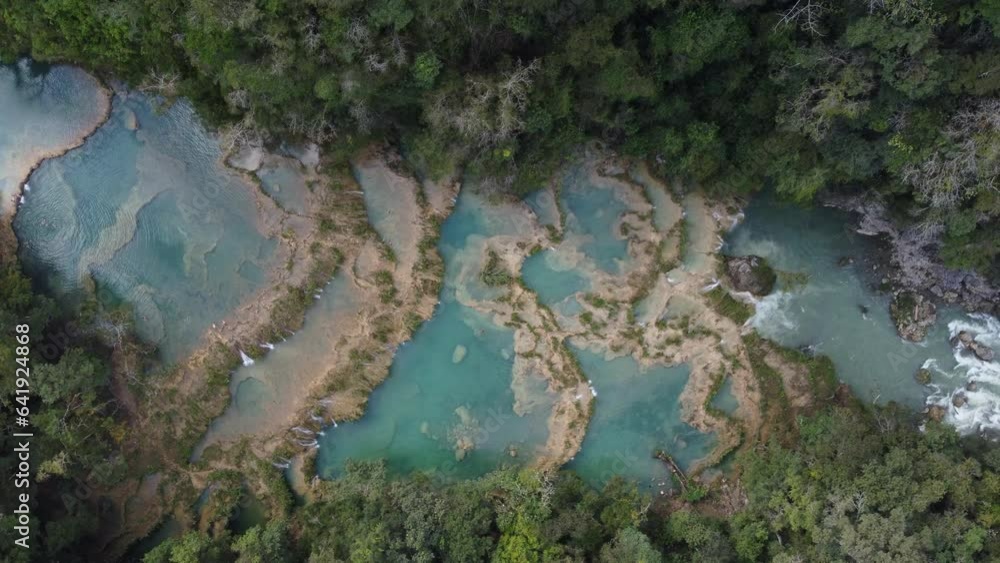 Straight down aerial of Semuc Champey river dam waterfalls, Guatemala ...