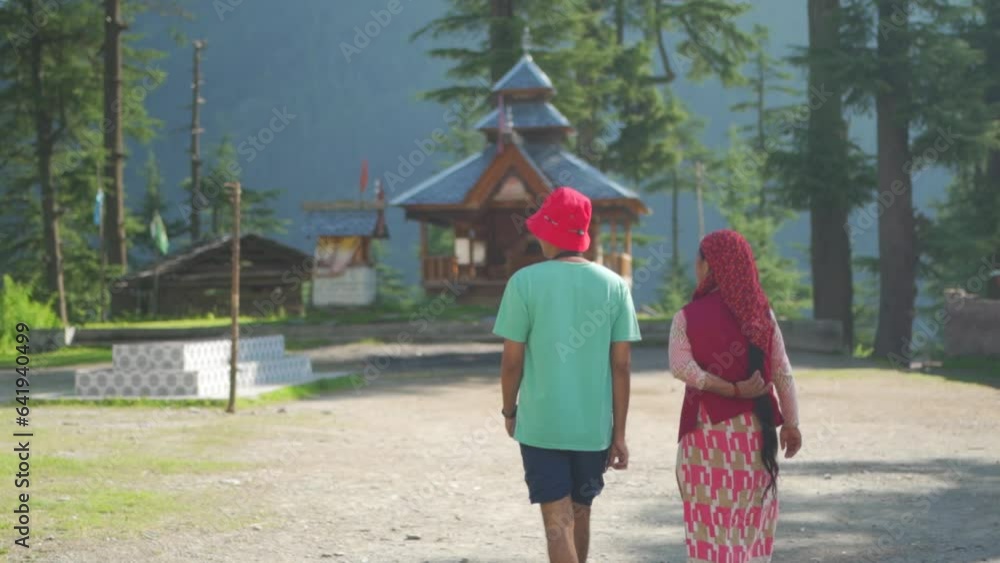 Jibhi, Himachal Pradesh, India - June 21 2023: Young Man and woman walk ...