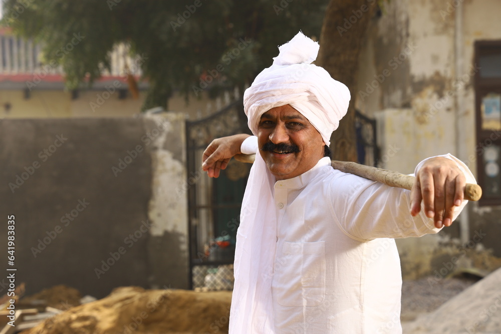 Mid-Aged man in Rural Environment wearing kurta-pajama which is ...