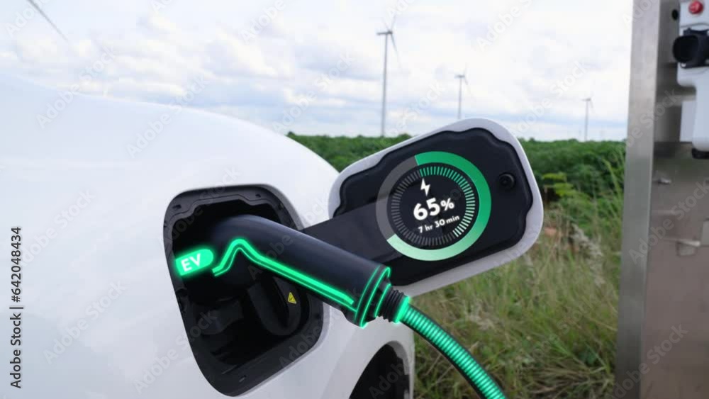 Electric car recharging energy from EV charging station display ...