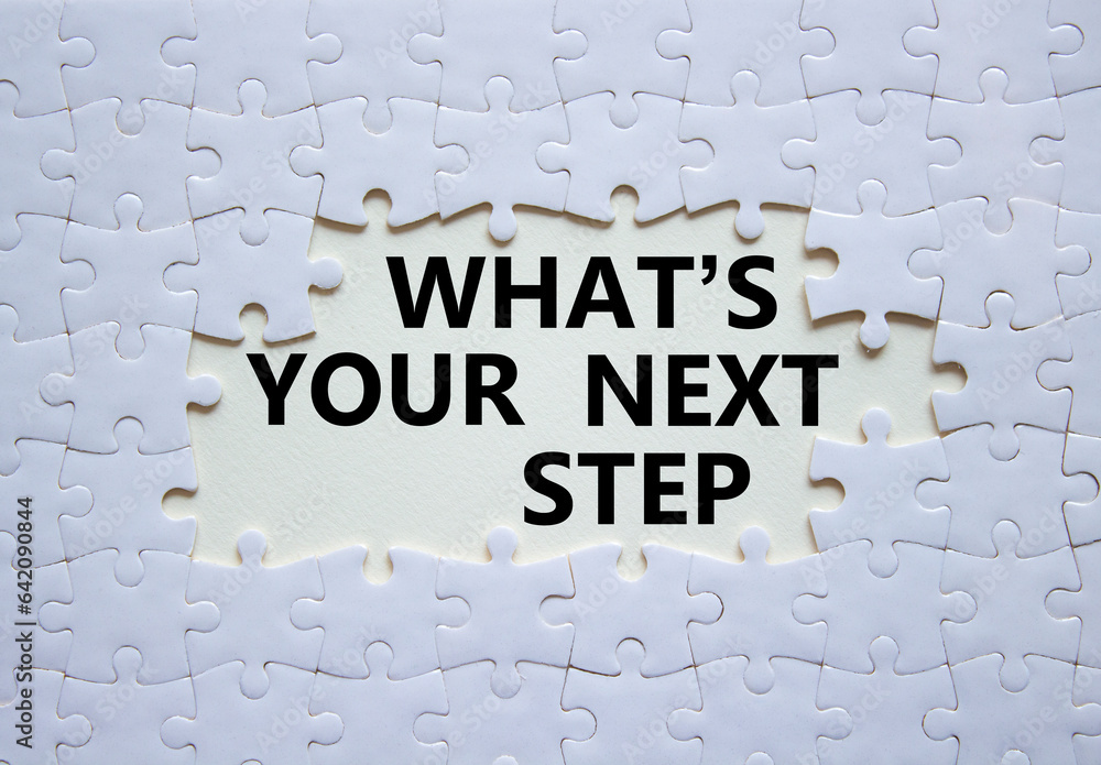 What is your next step symbol. White puzzle with words What is your ...