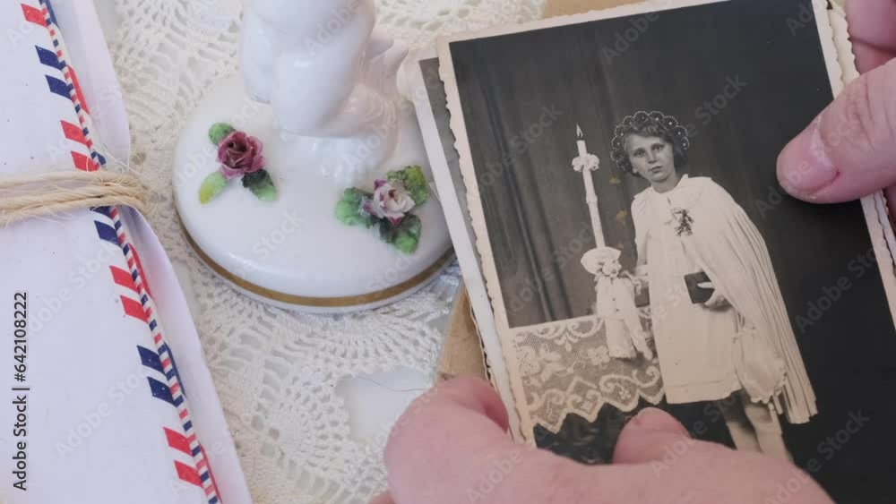 female hand hold old family photos, stack of old family vintage ...