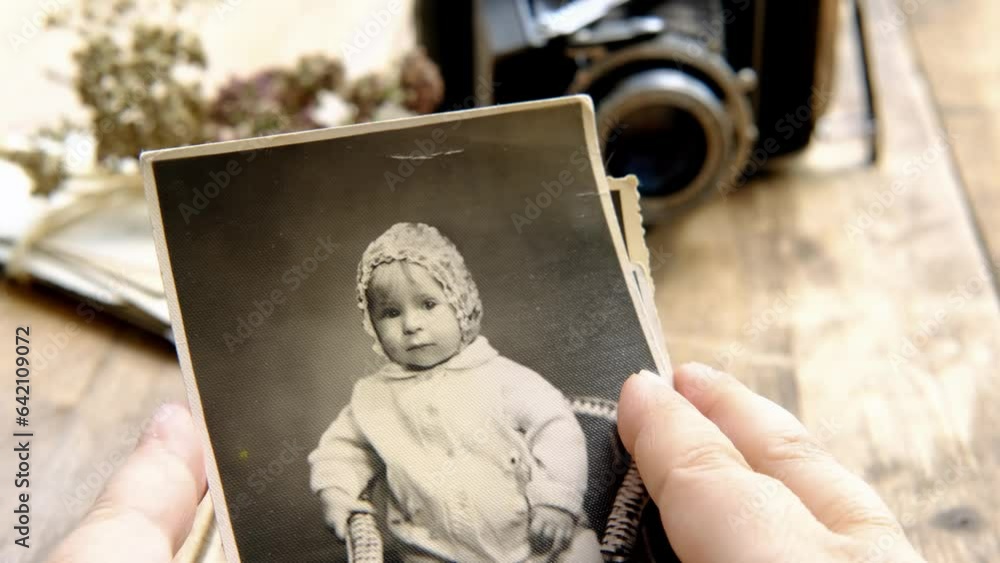 female hand hold old family photos, stack of old family vintage ...
