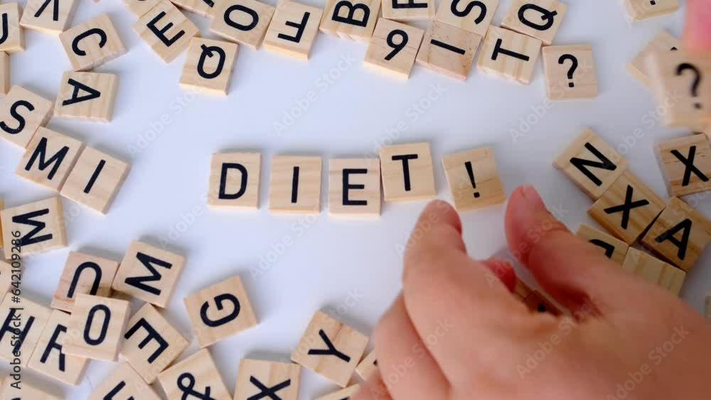 close-up of wood cube block tact diet on light table, concept of ...