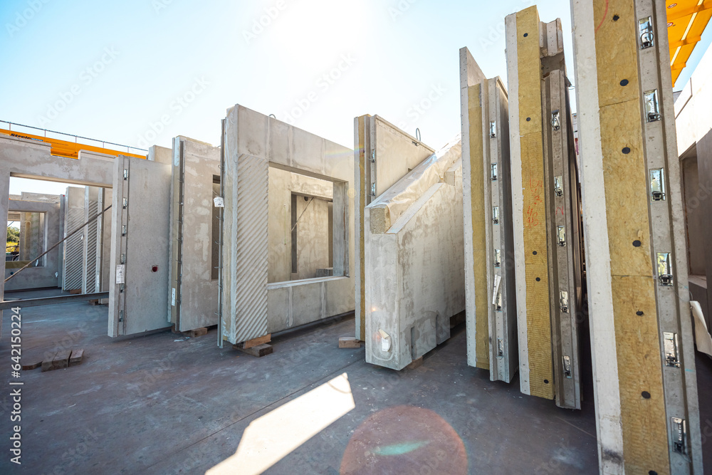 Precast concrete wall panels in factory to transport and install Stock ...