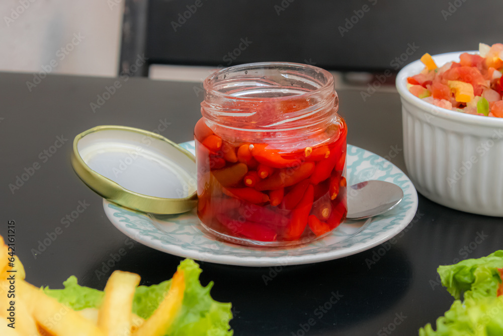 Pote com molho de pimenta caseiro brasileiro Stock Photo | Adobe Stock