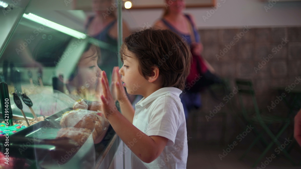 Child Leaning on Ice-Cream Glass Counter, Staring at Flavors, Childhood ...