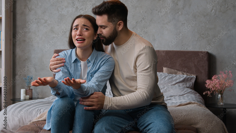 Caucasian man apologizing husband calming anxious annoyed wife ask ...