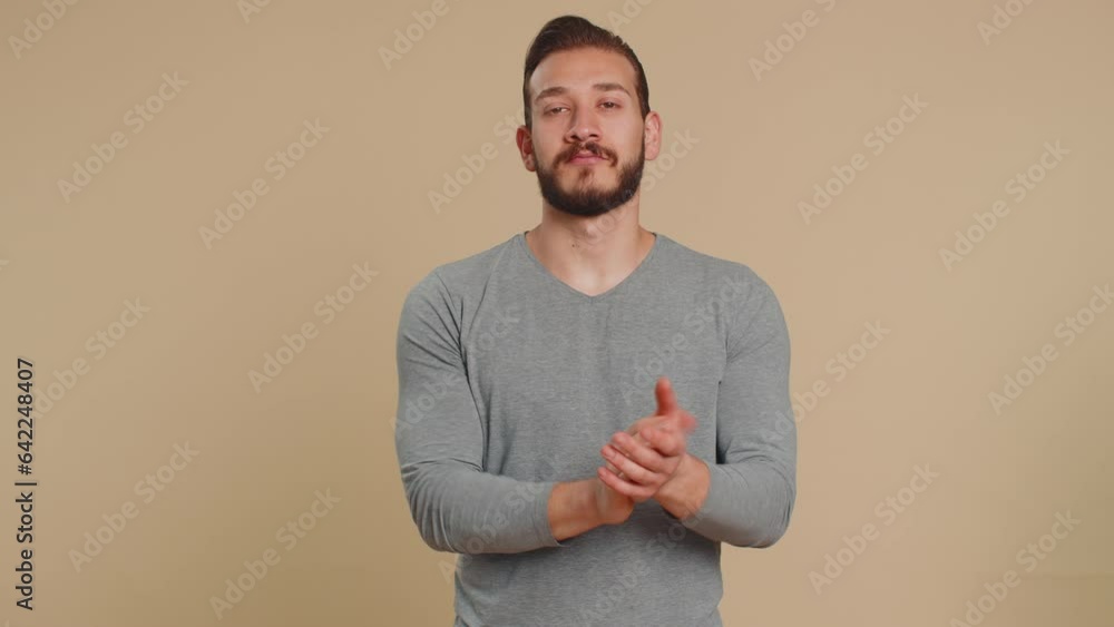 Well done good job. Lebanese young man showing thumbs up and nodding in ...
