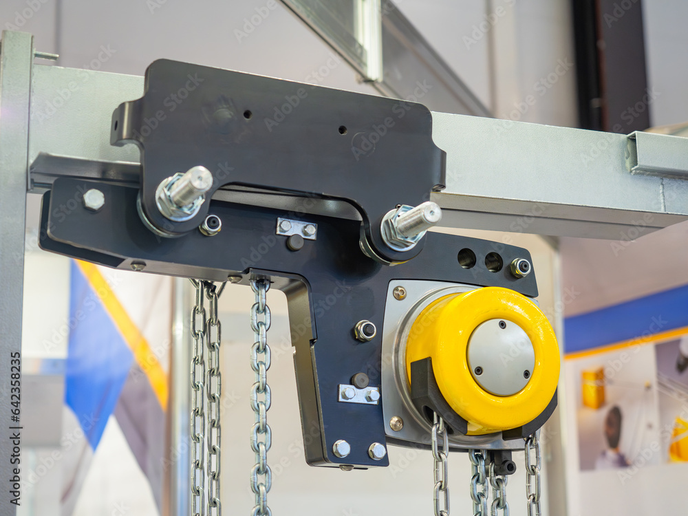 Tal manual chain. Load lifting equipment. Tal is attached to metal ...