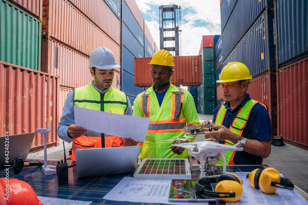 Industrial Engineer checking inventory about solar cell and turbine at ...