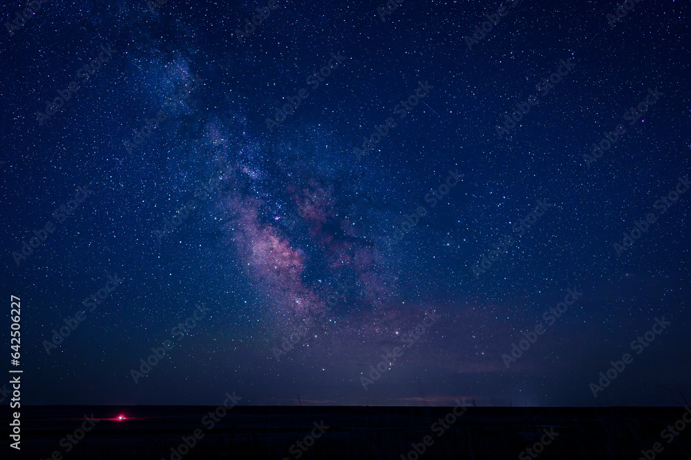 Milky Way galaxy center stars in pink and blue dark sky wyoming ...