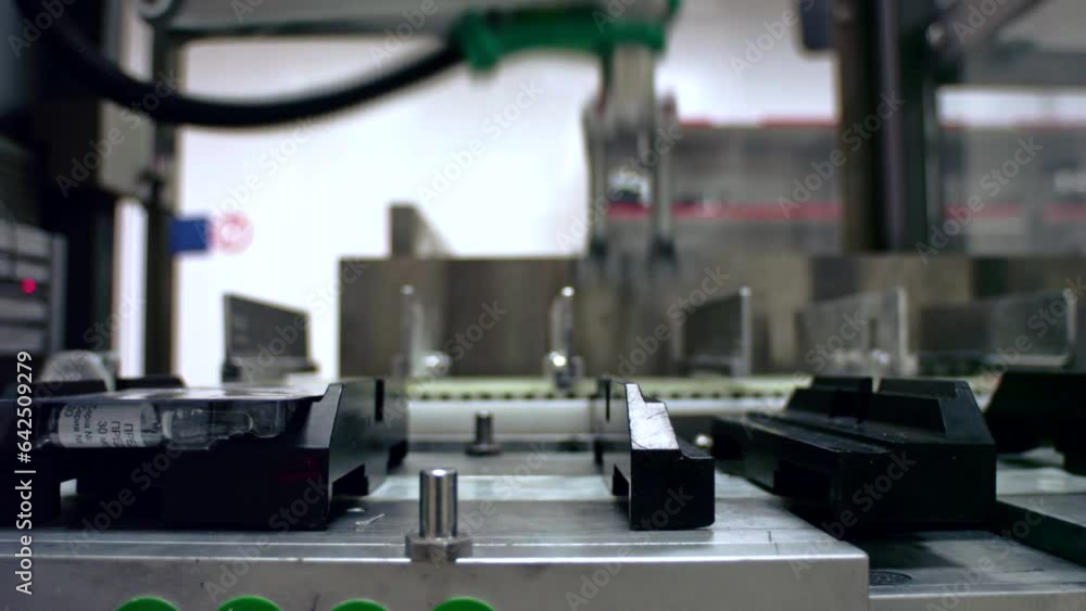 manufacture robotic arm in action move to packaging and assembling ...