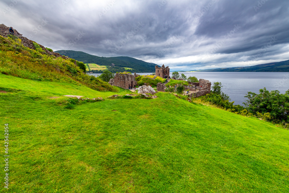 The medieval ruins of the hilltop Urquhart Castle fortification along ...