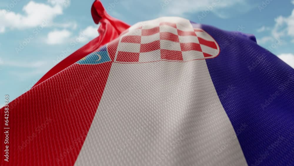 Wavy flag of Croatia blowing in the wind in slow motion. Waving colorful Croatian flag team ...
