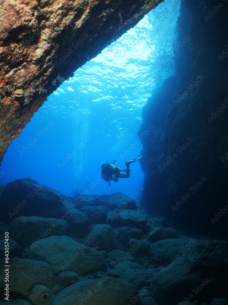 cave diving underwater scuba divers exploring caves and having fun ...
