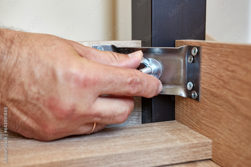 The table leg is attached with an angle screw. Installation and ...