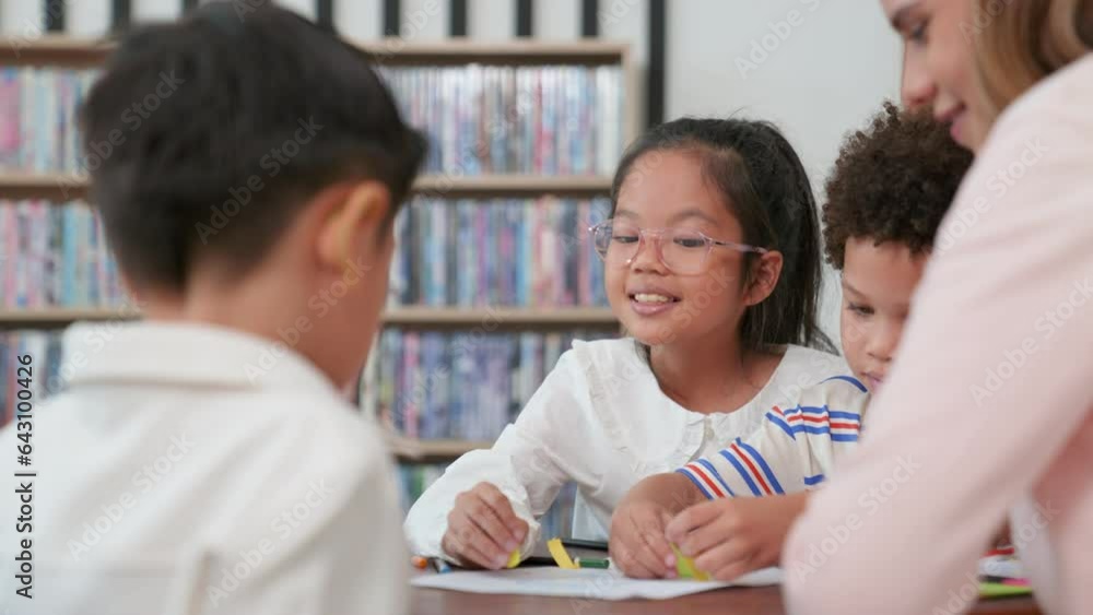 Multi-ethnic students of different nationalities learning together in a ...