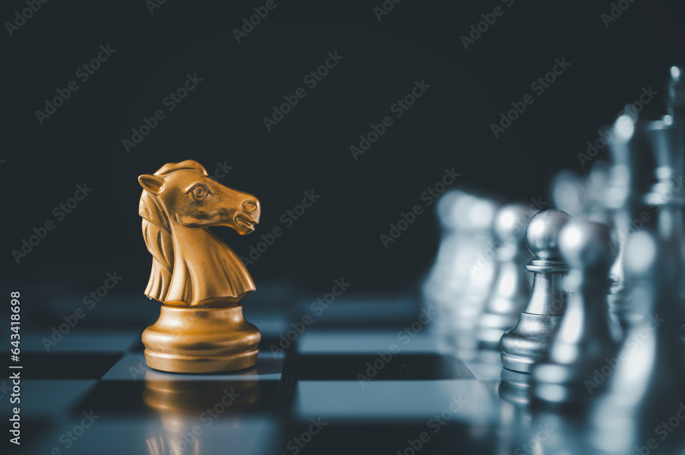 horse golden chess standing confront of the silver chess team.chess ...