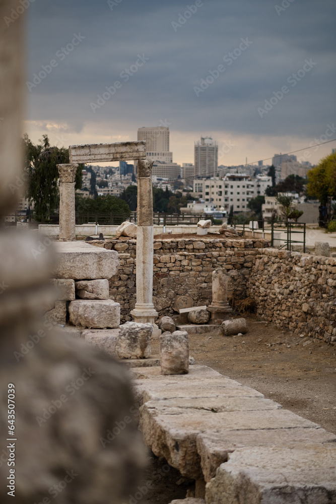Freestanding columns, the ruins of an ancient Roman temple, stand tall ...