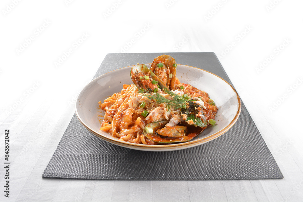 seafood pasta with big tiger prawn, scallop shell clam and muscle in ...