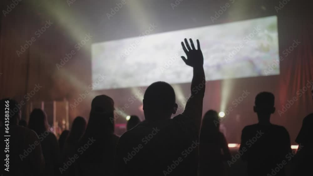 Hands of a crowd of people at a Christian meeting during the ...