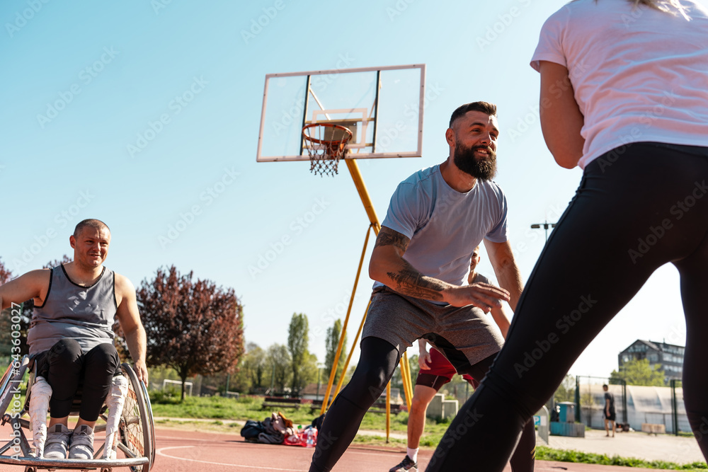 A physically challenged man in a wheelchair fearlessly engages in a ...