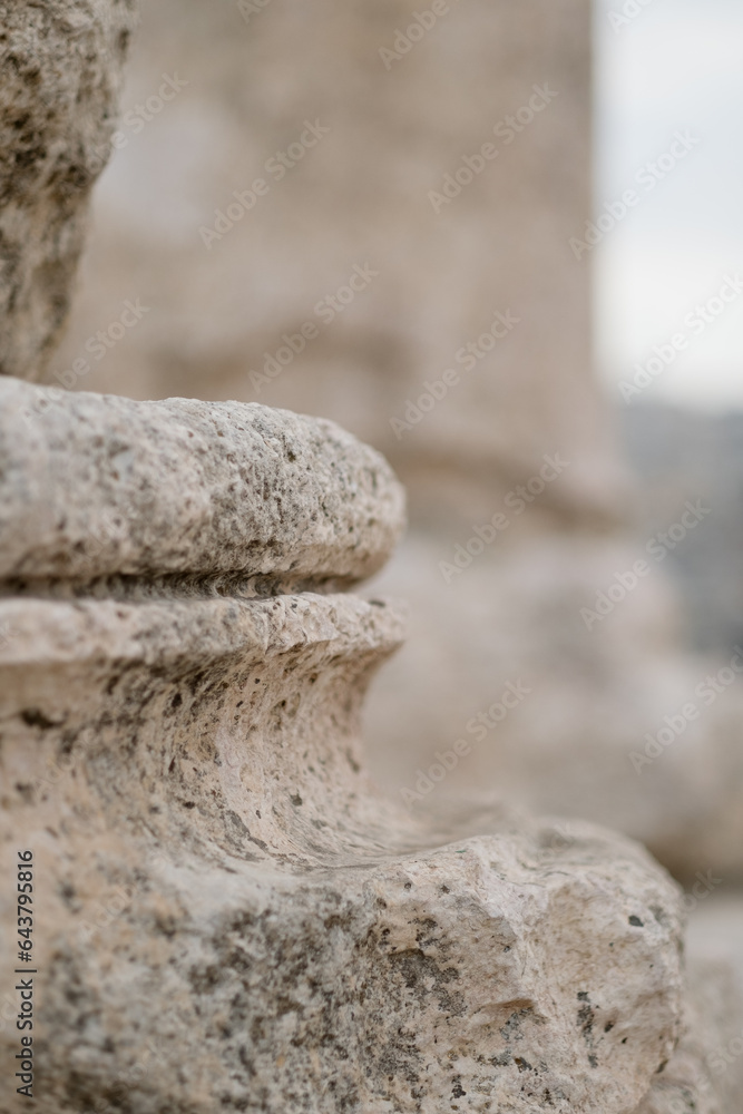 At the Amman Citadel, a carved pedestal supports a grand Roman column ...