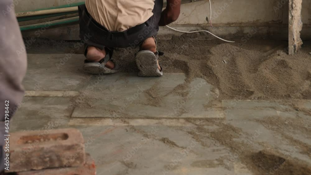 Vidéo Stock Renovation floor tile. The artist chiseled the marble tile ...