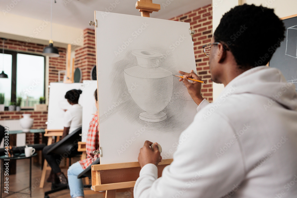 Young people friends attending drawing class, learning new skills ...