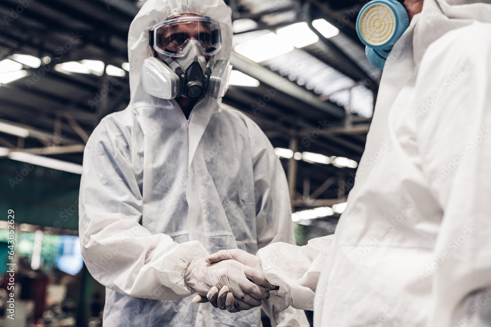 Scientist wear Chemical protection suit check danger chemical, working ...