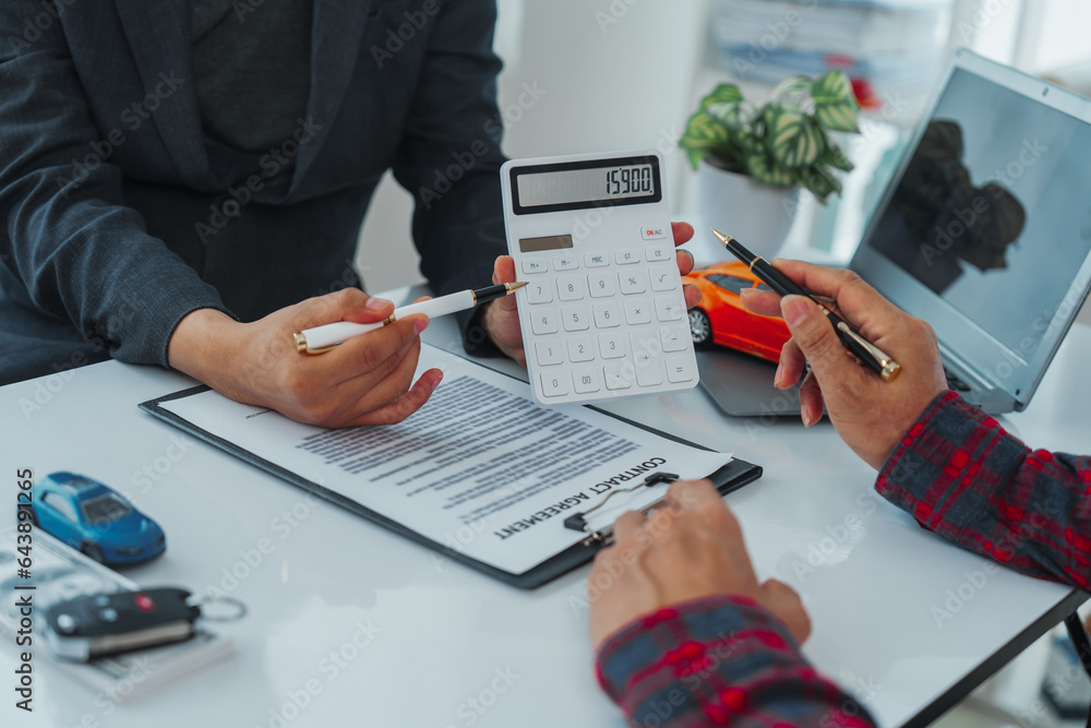 Businessman completes successful car purchase transaction by gifting ...