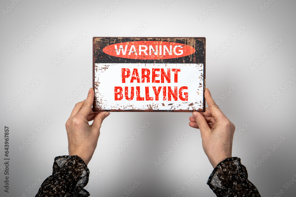 PARENT BULLYING. Warning sign with text on a white background Stock ...