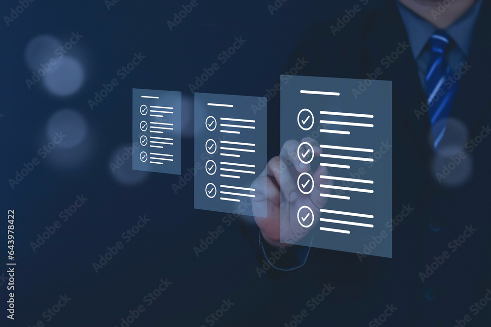 Businessman showing check mark summarizing job Compile lists, votes ...