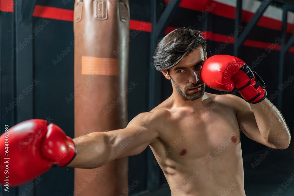 Handsome Middle Eastern man with a muscular body physique showing how ...