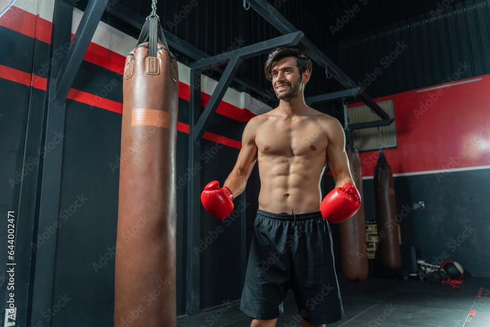 Handsome Middle Eastern man with a muscular body physique showing how ...