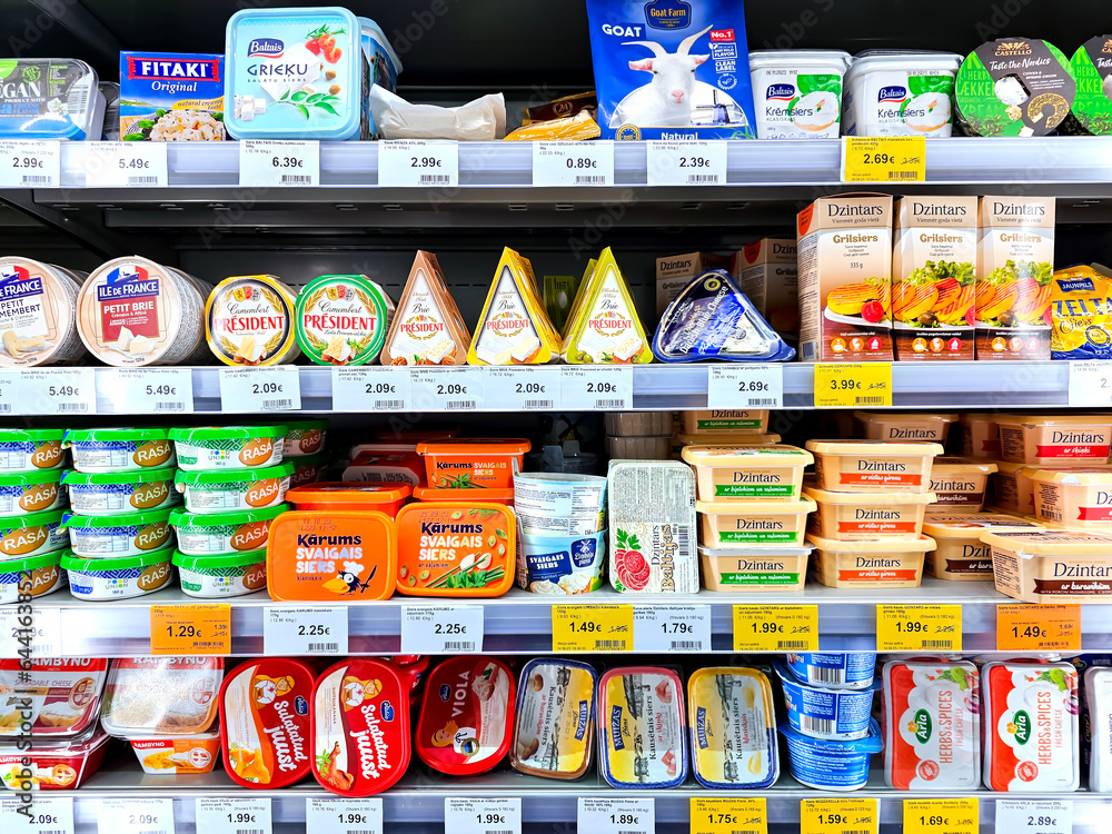 Latvia, Riga, 30, August, 2023: A large selection of cheeses with ...