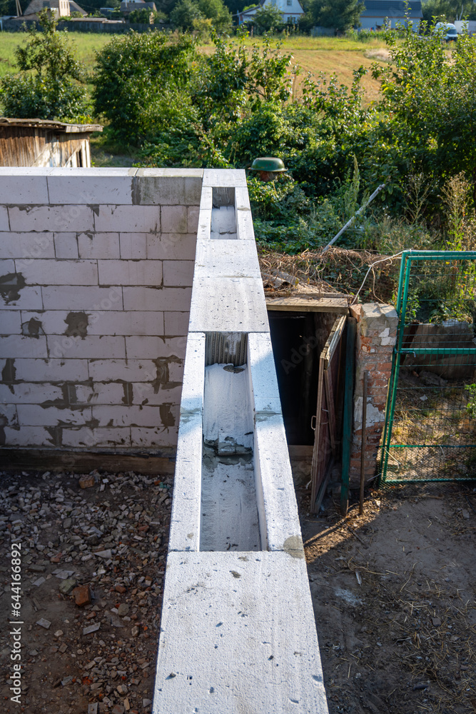 Wall of aerated concrete blocks, preparation for pouring concrete ...