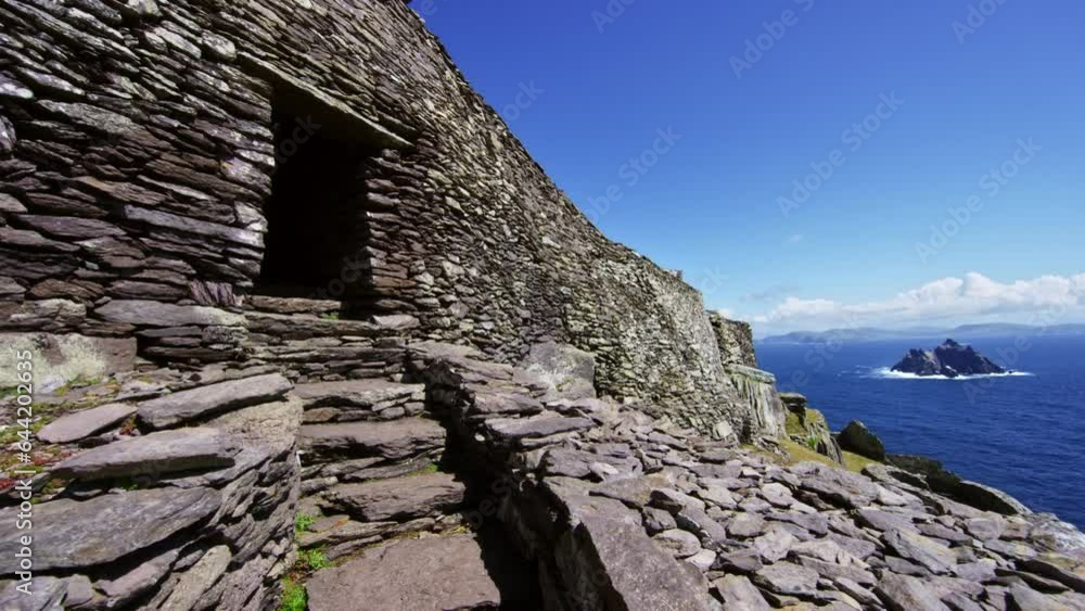 Skellig Michael camera flying through ancient structures and rock homes ...