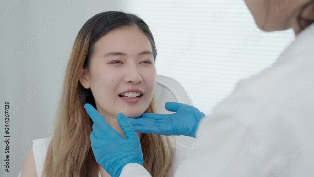 Cosmetic surgery, beauty, Surgeon or beautician touching woman face ...