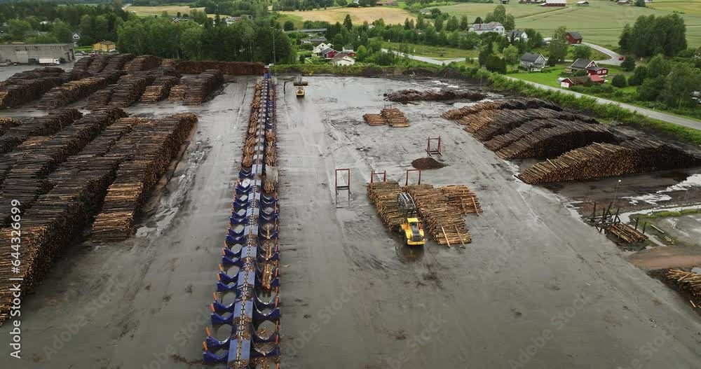 Wheel Loader Working And Stacking Lumber At Industrial Area In ...