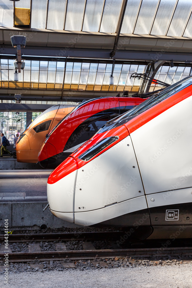 Passenger trains of SBB Schweizerische Bundesbahnen and Südostbahn at ...