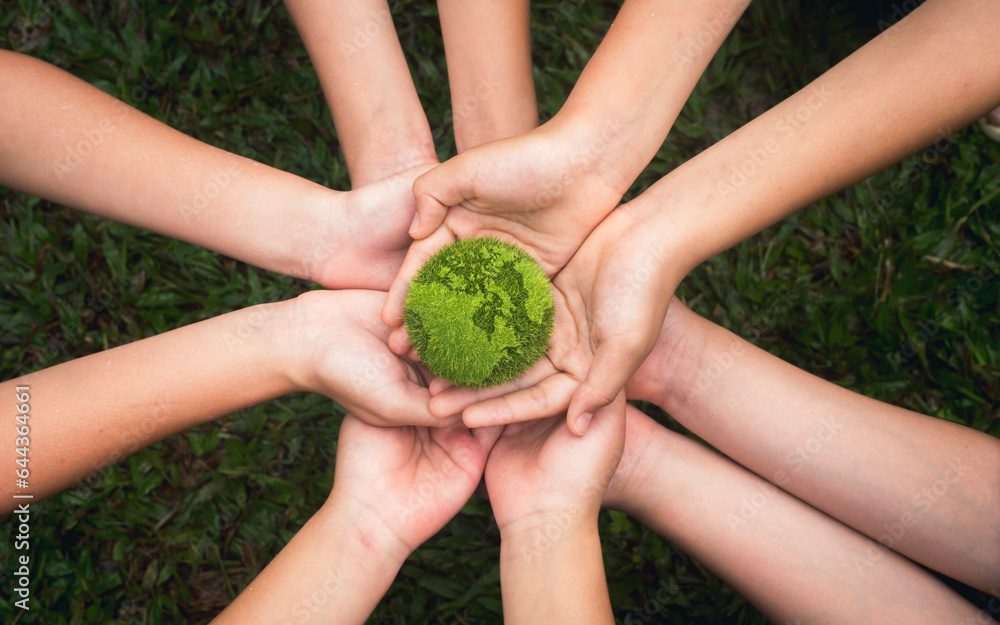 world environment day hand holding green globe on green background ...