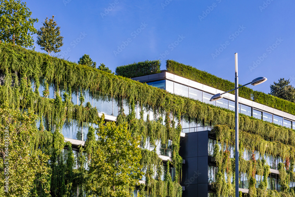 Germany, Baden-Wurttemberg, Stuttgart, Overgrown facade of office ...