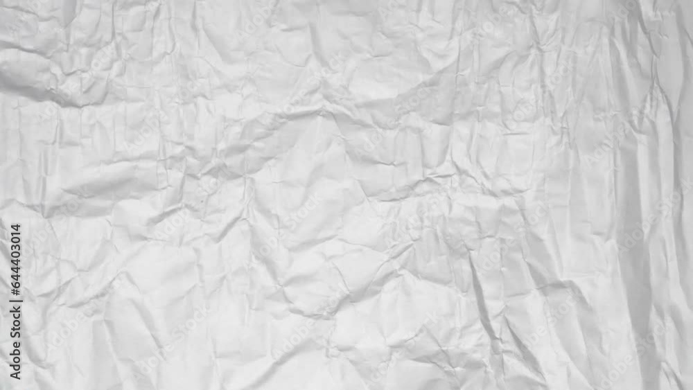 Stop motion scene of smooth white paper transform to rumple from left ...