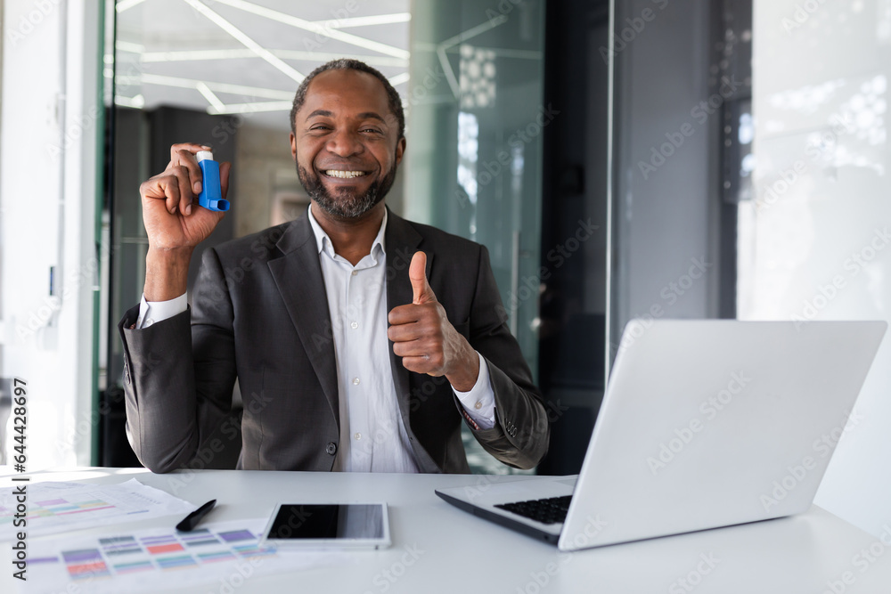 Satisfied patient after treatment with asthma inhaler, man inside ...