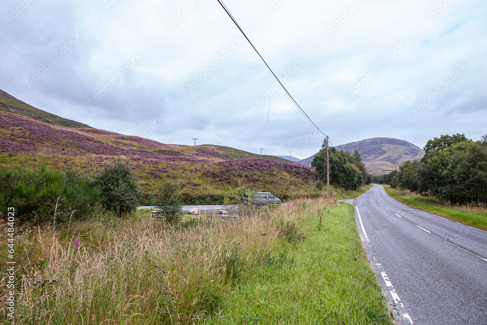 Roads turning in Scotland highlands scenery. Road leaving to infinity ...